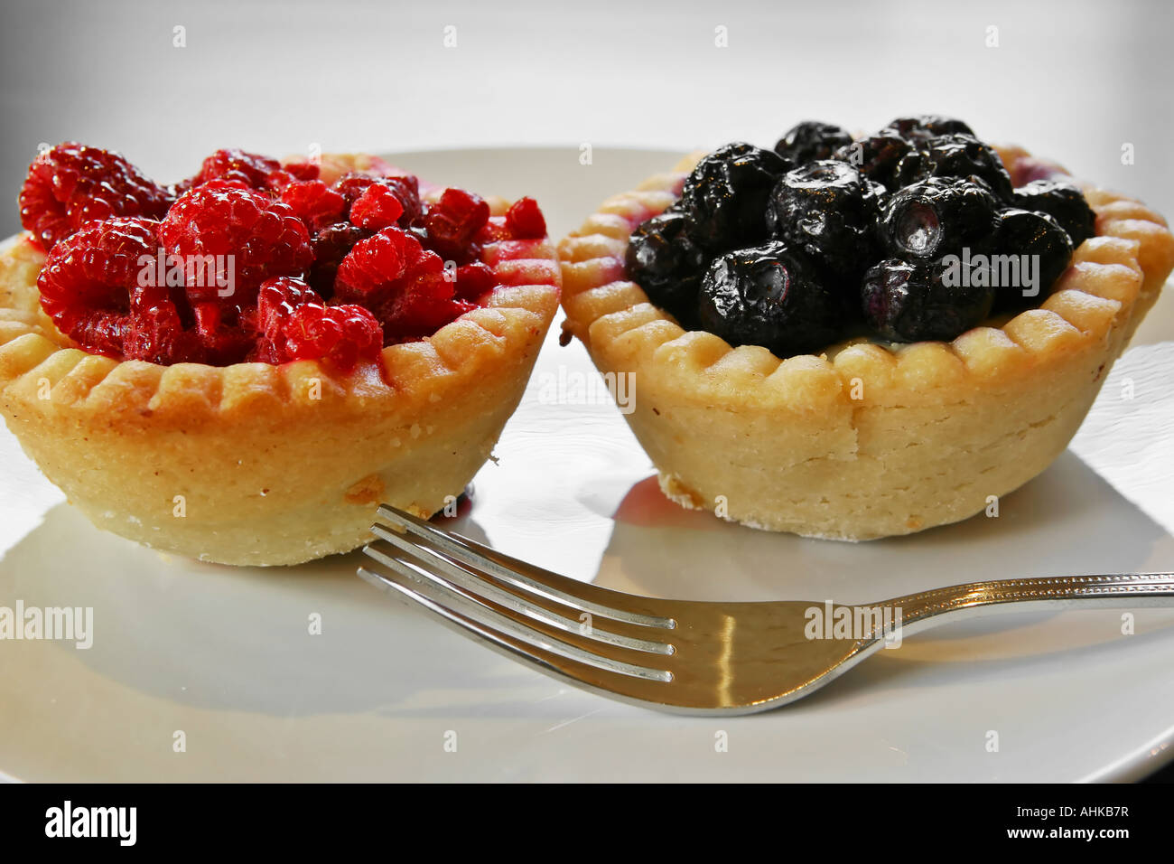 Two custard tarts hi-res stock photography and images - Alamy