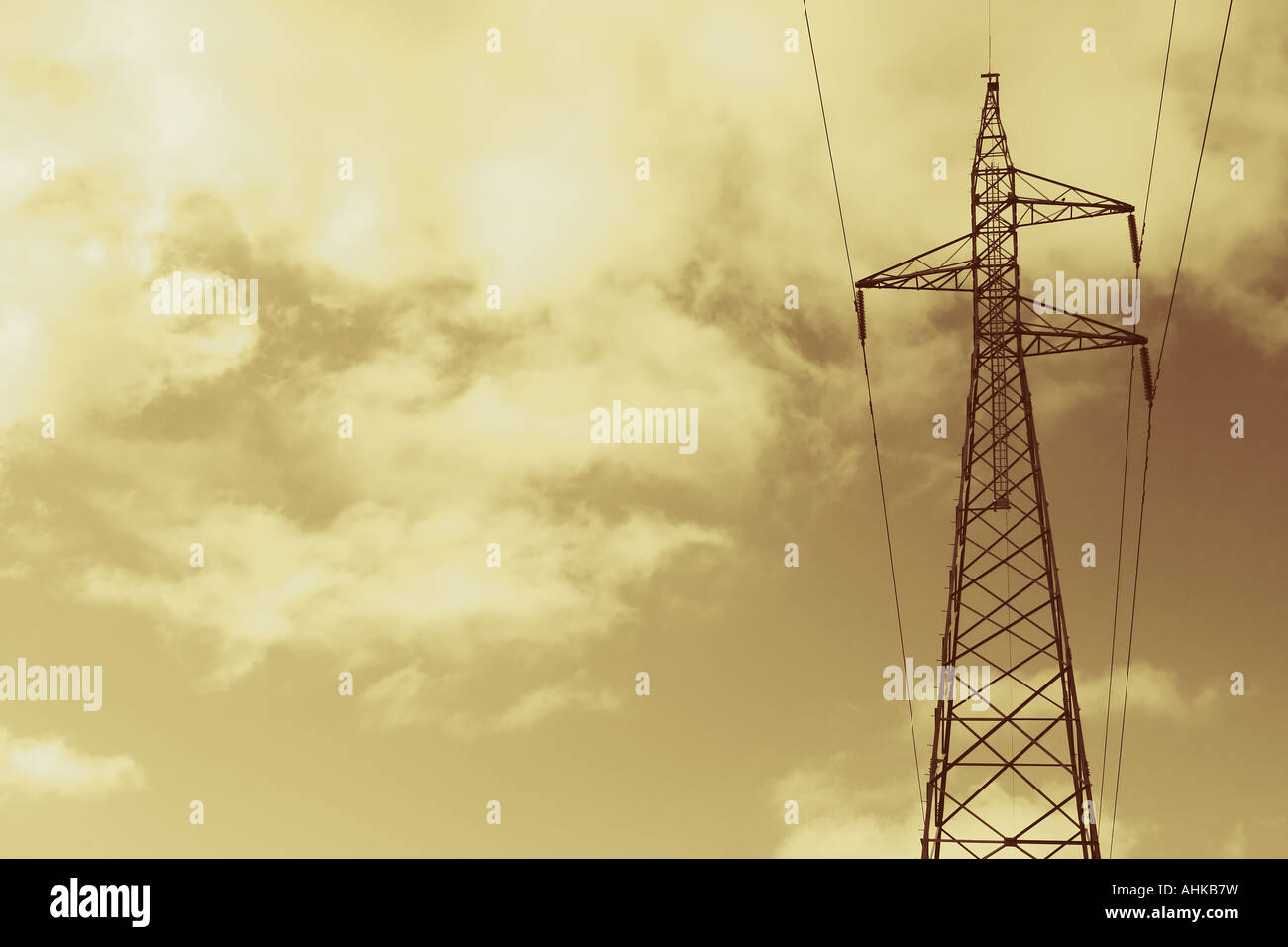 High voltage power lines in gold tone Stock Photo - Alamy