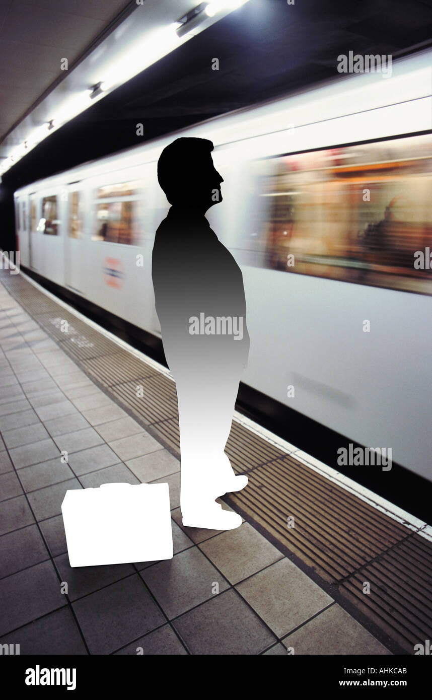 Man waiting for train Stock Photo - Alamy