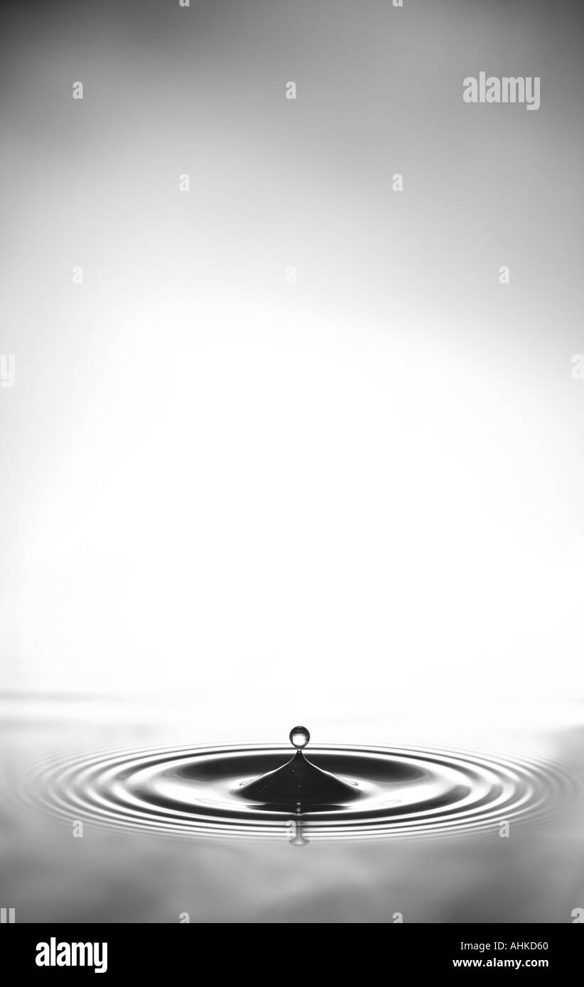 water drop on water surface Stock Photo - Alamy