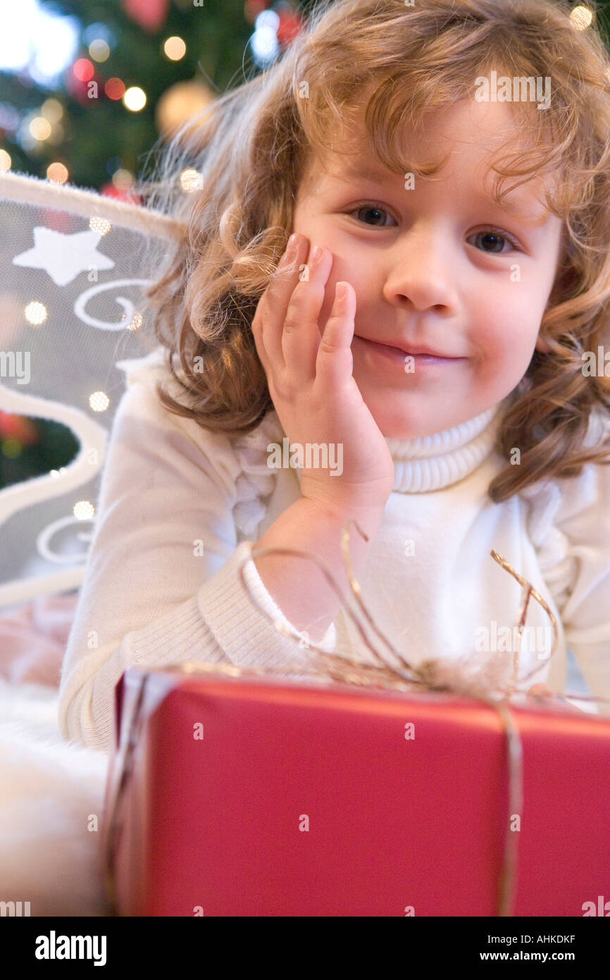 Baby christmas christmas christmas tree feast girl hi-res stock ...