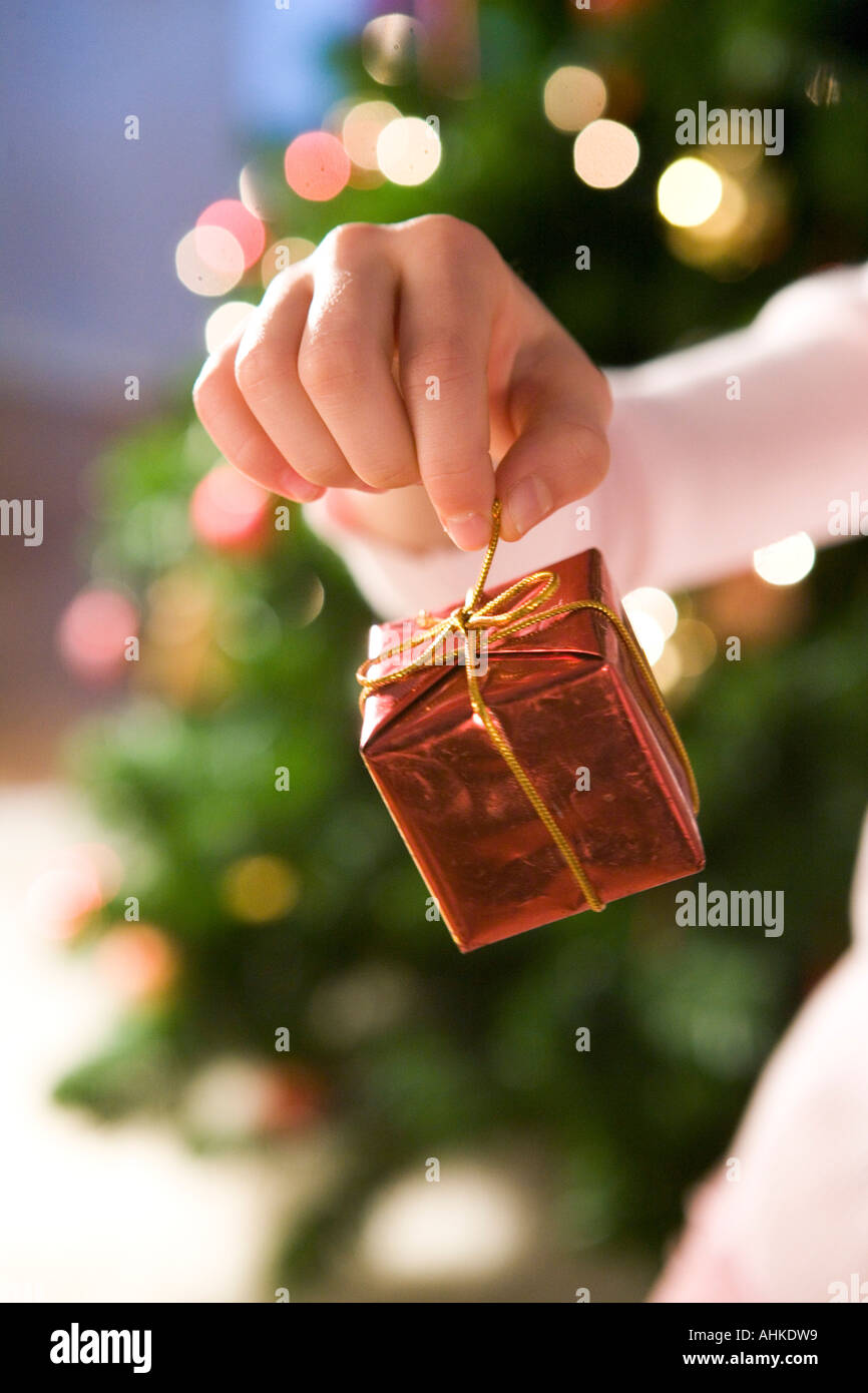 small gift in small hand Stock Photo - Alamy