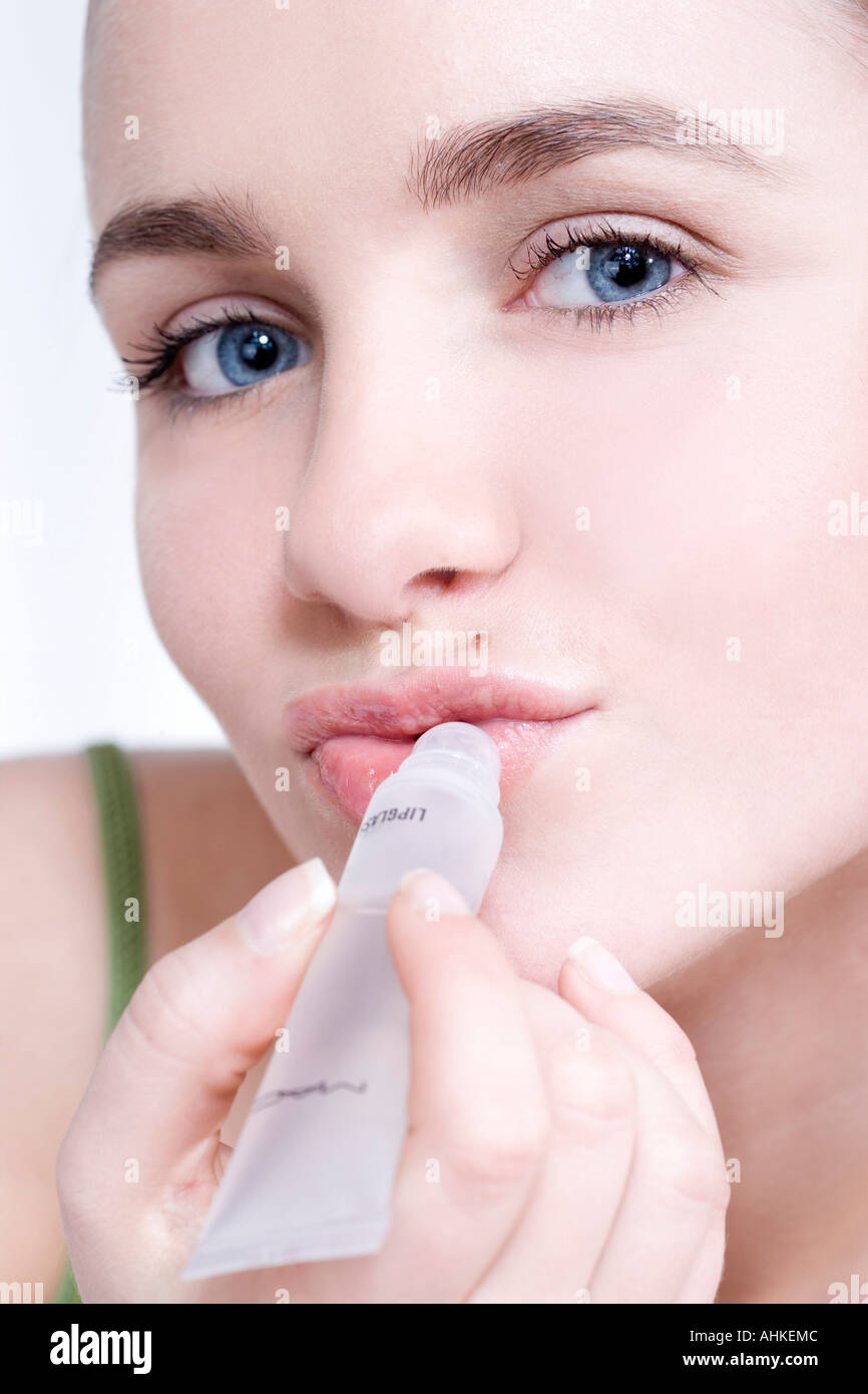 Applying lipbalm hi-res stock photography and images - Alamy