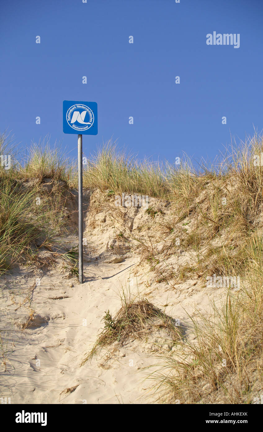 Sign "mud flats national park germany" in dunes Stock Photo - Alamy
