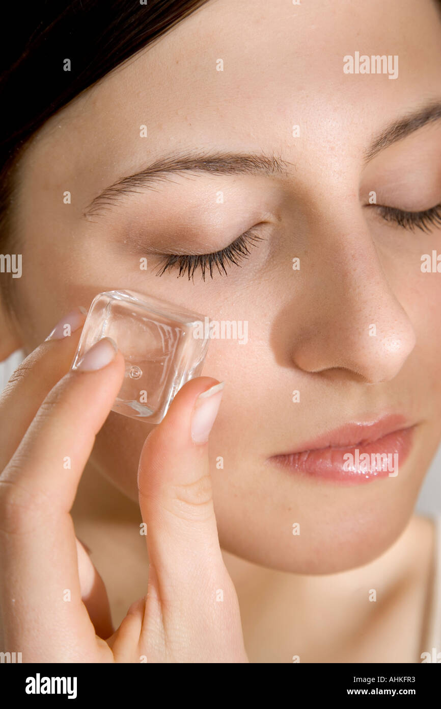 Woman face ice cube hi-res stock photography and images - Alamy