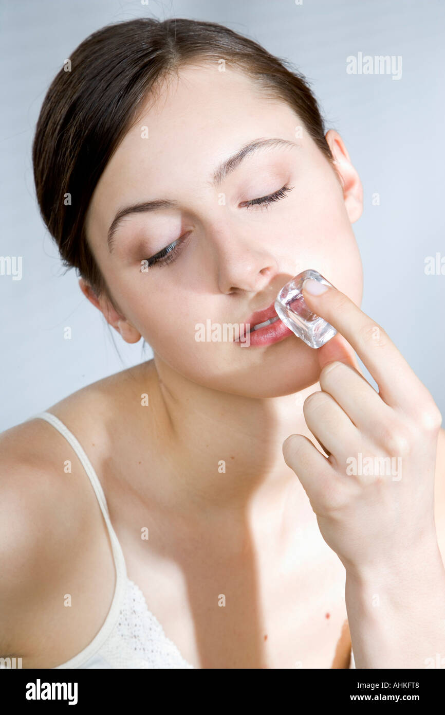 Ice cube woman skin hi-res stock photography and images - Alamy