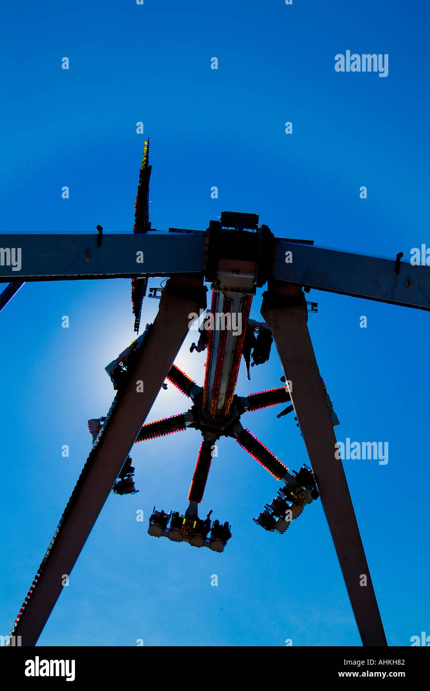 Action shot of carnival midway ride with riders Stock Photo - Alamy