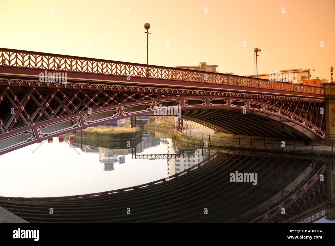 Sunrise behind Crown Point Bridge an cast iron bridge over River Aire ...