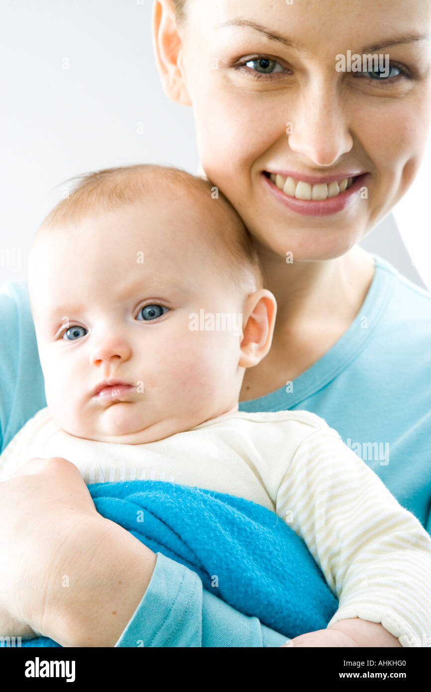 portrait of a mum with baby Stock Photo - Alamy