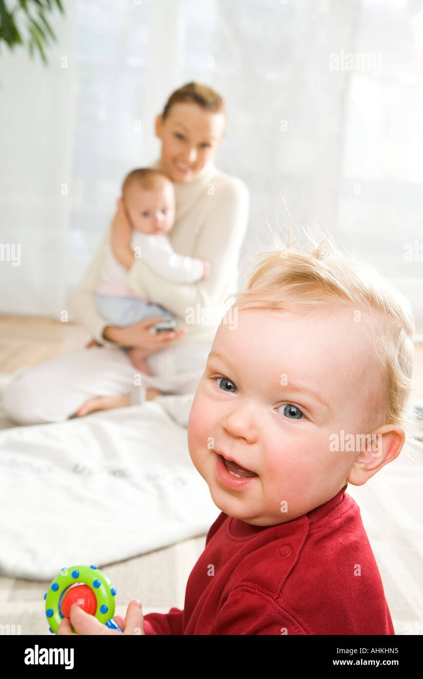 mother with two babies Stock Photo - Alamy