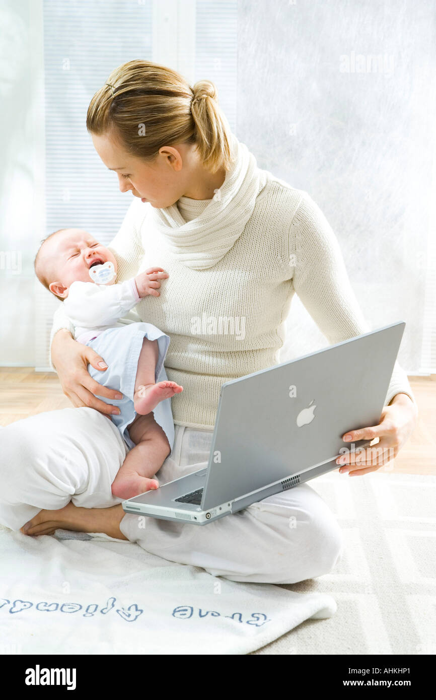 Baby with laptop crying hi-res stock photography and images - Alamy