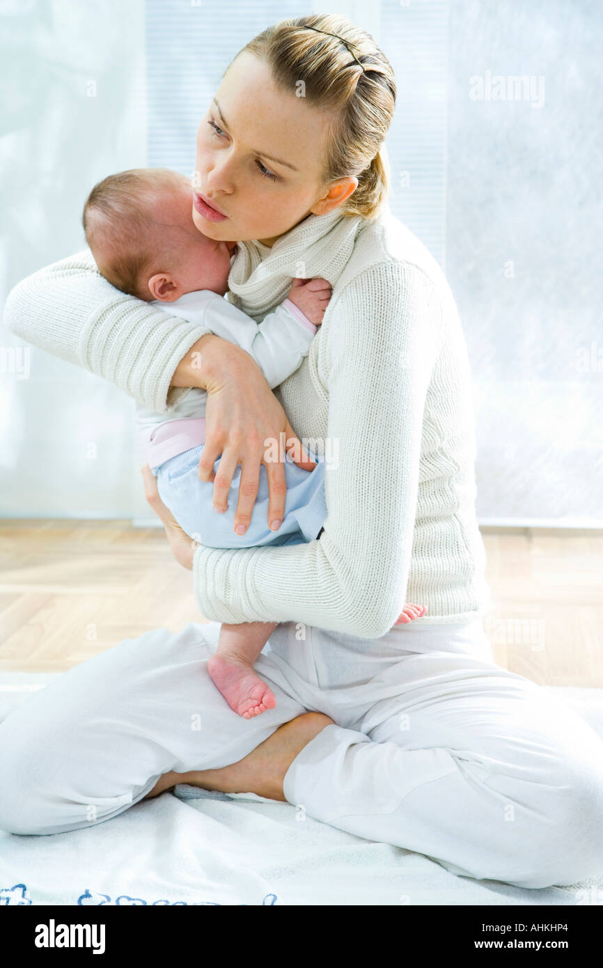 mum hugging baby Stock Photo - Alamy