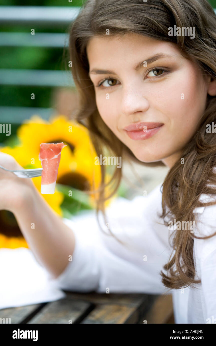 woman eating ham Stock Photo - Alamy