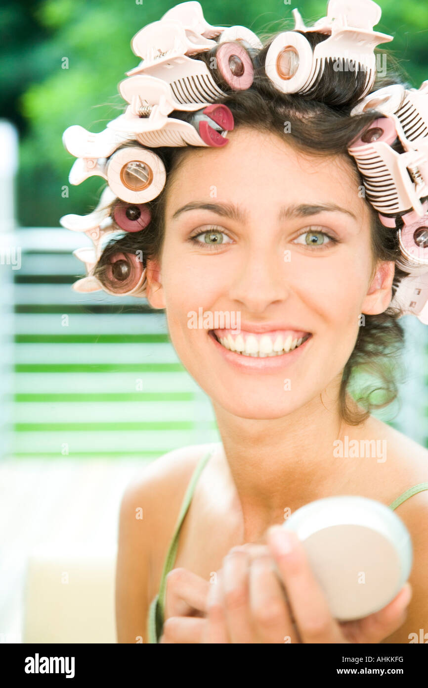 Well being woman serious eye contact hold holding female young hi-res ...