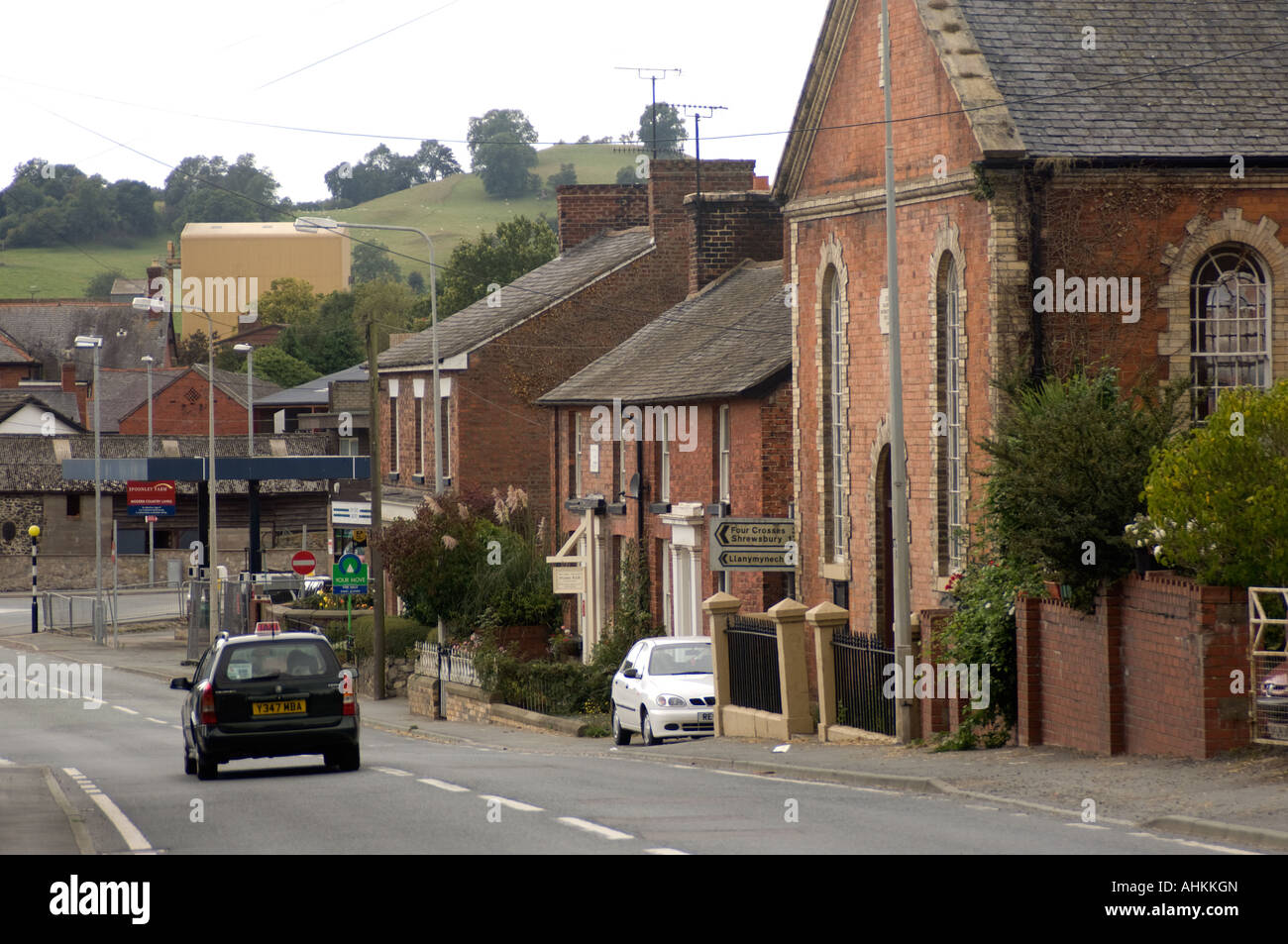 car driving down the main road through Llansanffraid or Llansantffraid ...