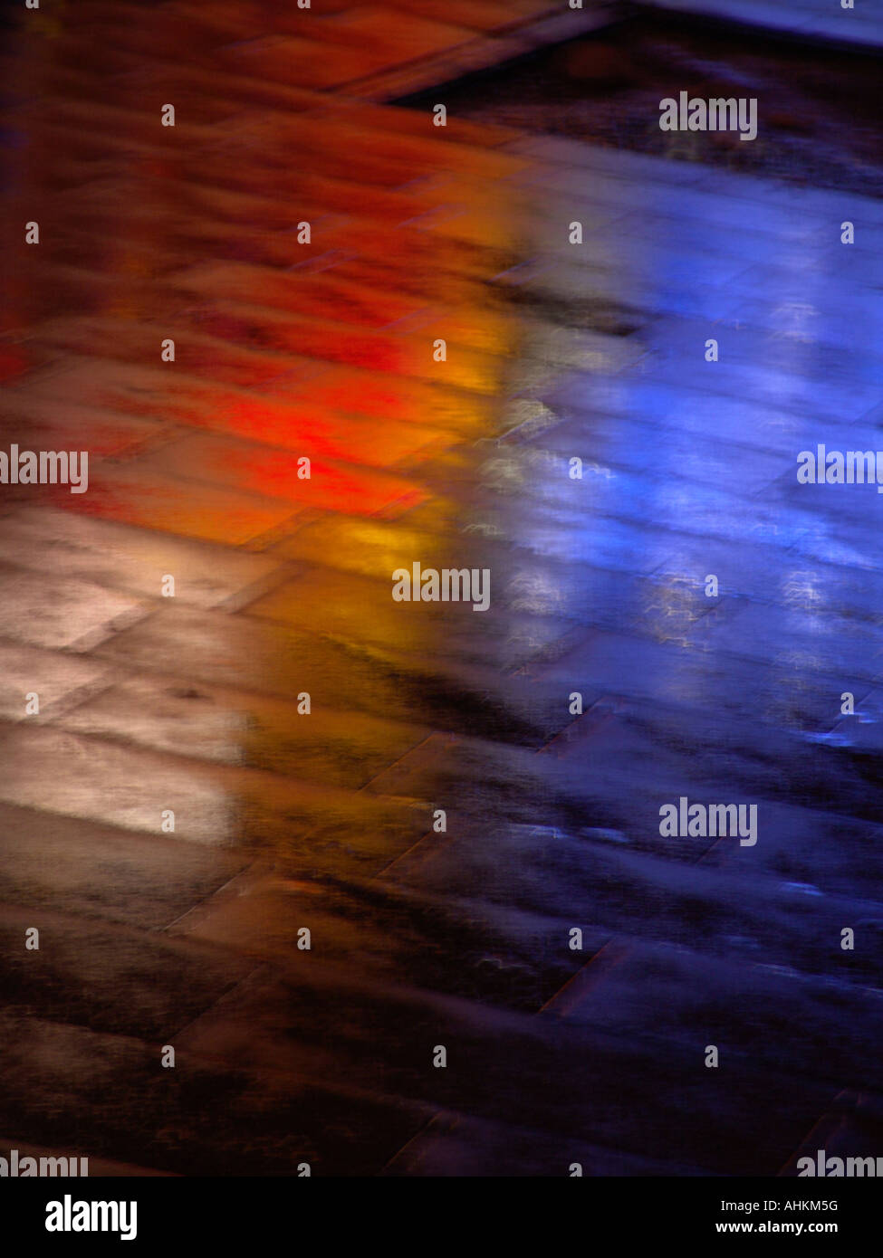 blurred neon signs and rays of light reflecting in water,contemporary ...