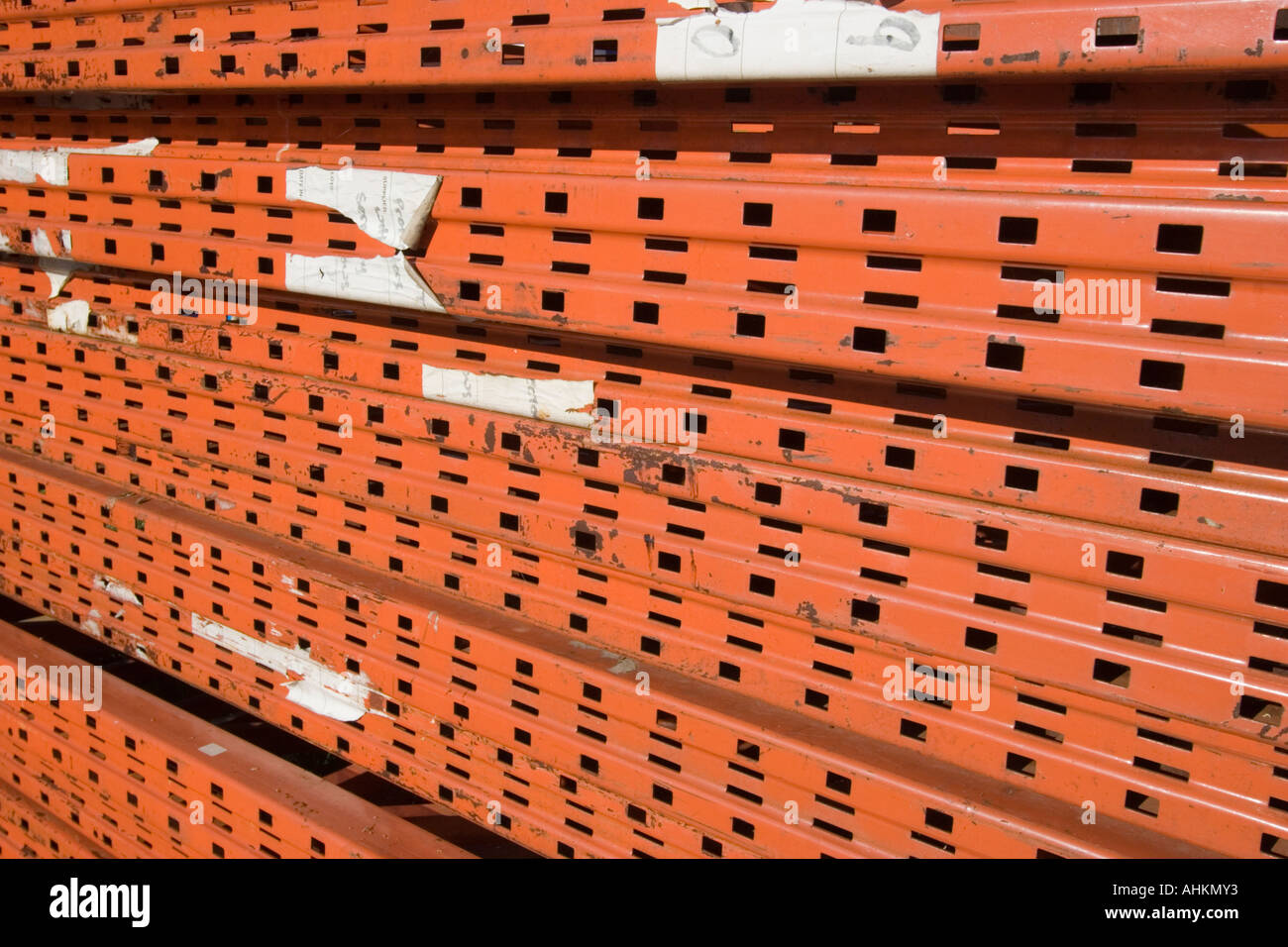 Orange shelving units stacked up before use Stock Photo - Alamy