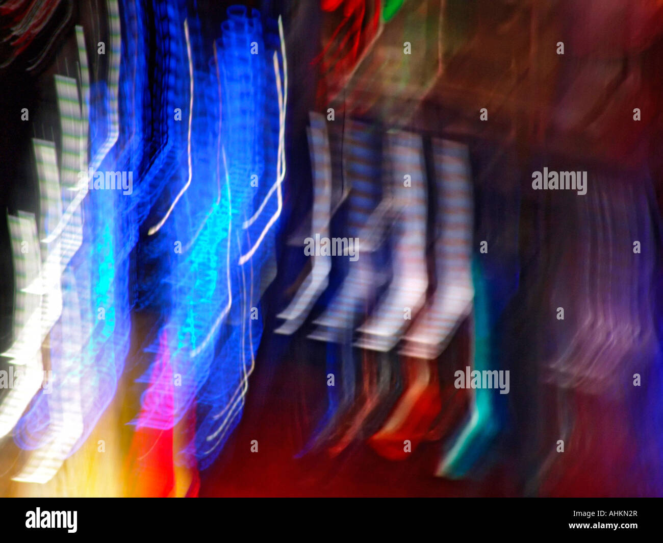 blurred neon signs and rays of light Stock Photo - Alamy
