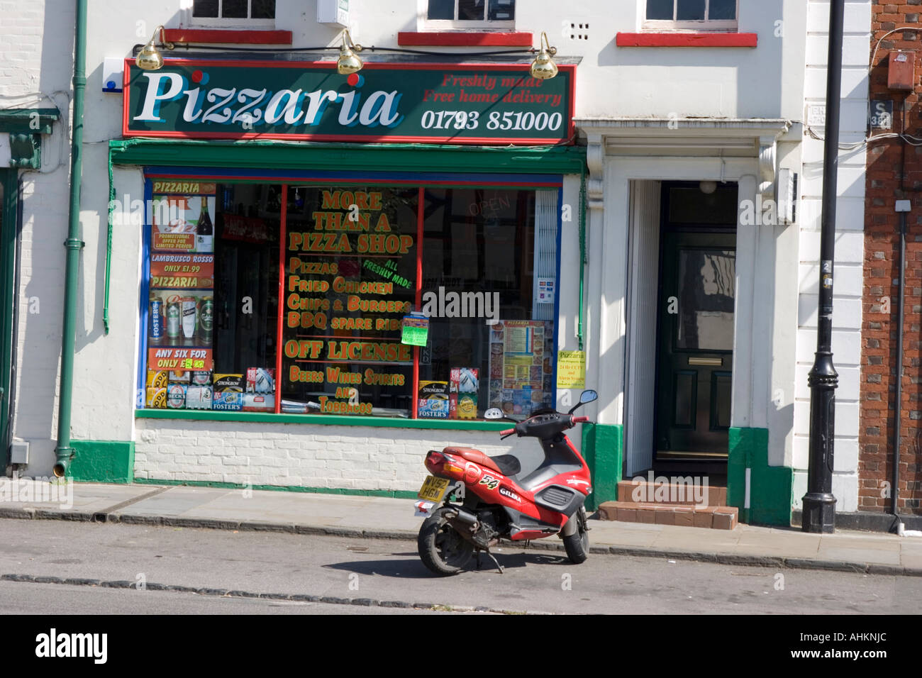Pizzaria and pizza delivery moped in Wootton Bassett Wiltshire Stock ...