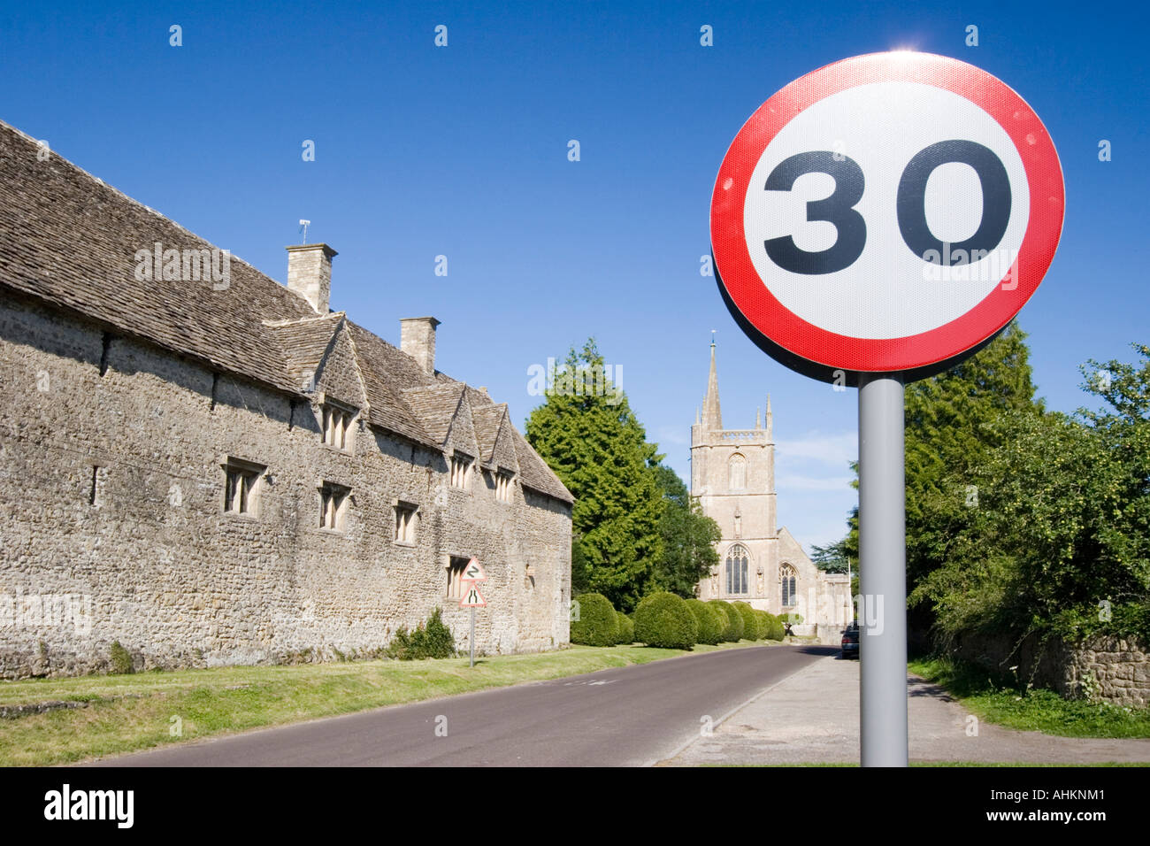 Speed limit sign 30mph on quiet country rural road Stock Photo - Alamy