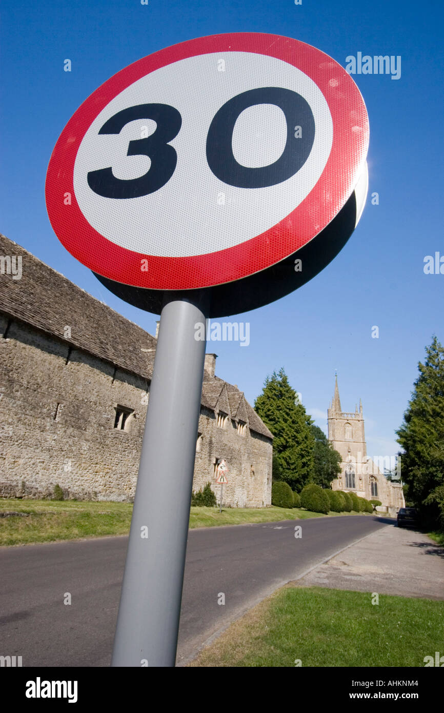 Speed limit sign 30mph on quiet country rural road Stock Photo - Alamy
