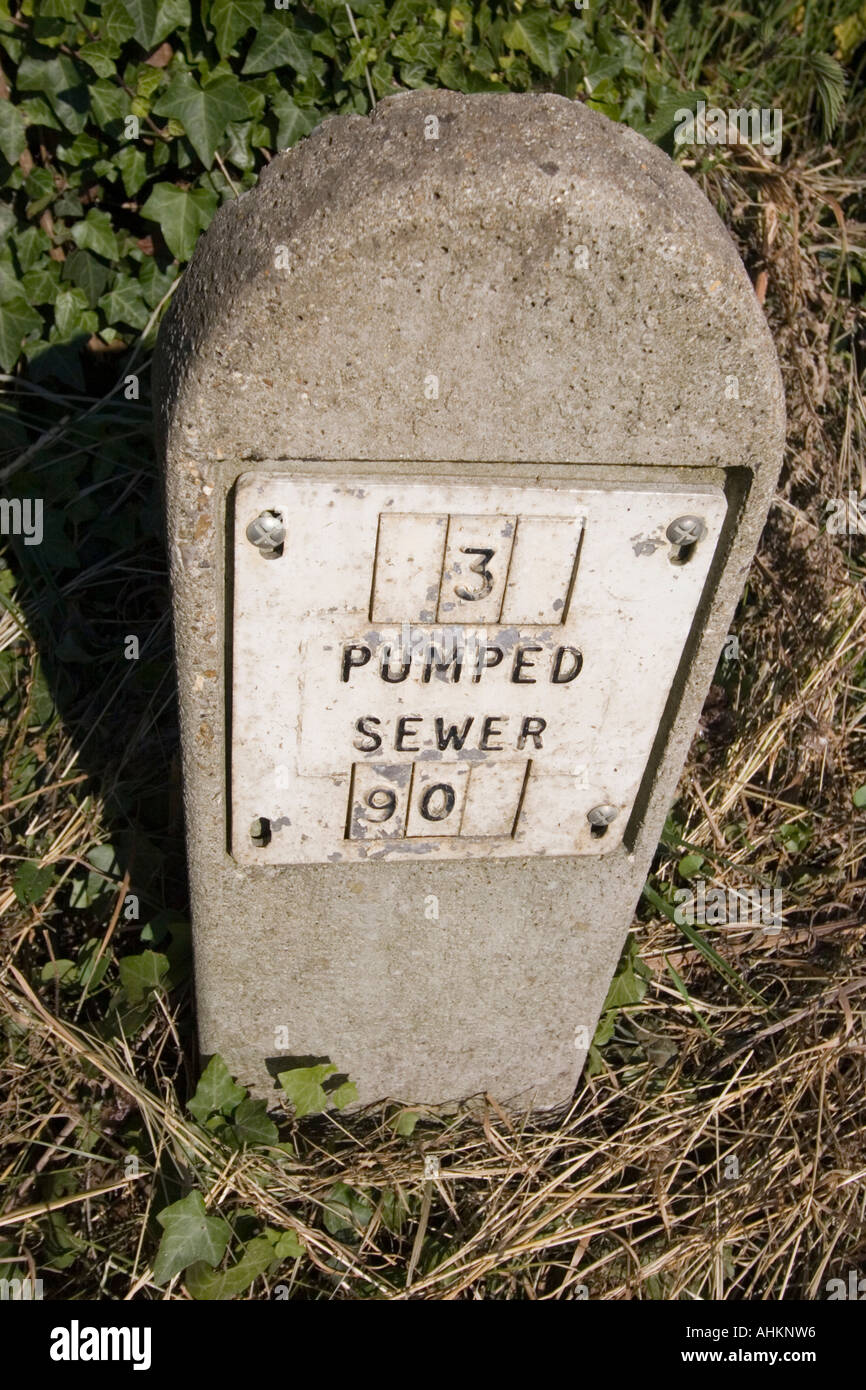 Marker for pumped sewer Stock Photo - Alamy