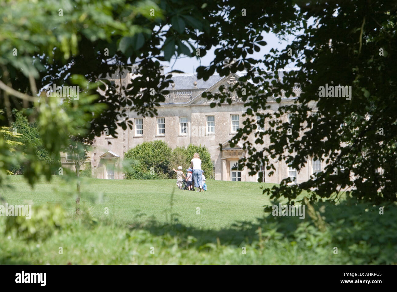 Lydiard house glimpsed through the trees of surrounding parkland Stock ...