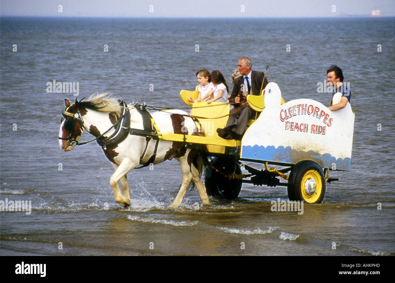 Horse and cart ride many years ago in the sea at Cleethorpes in the ...