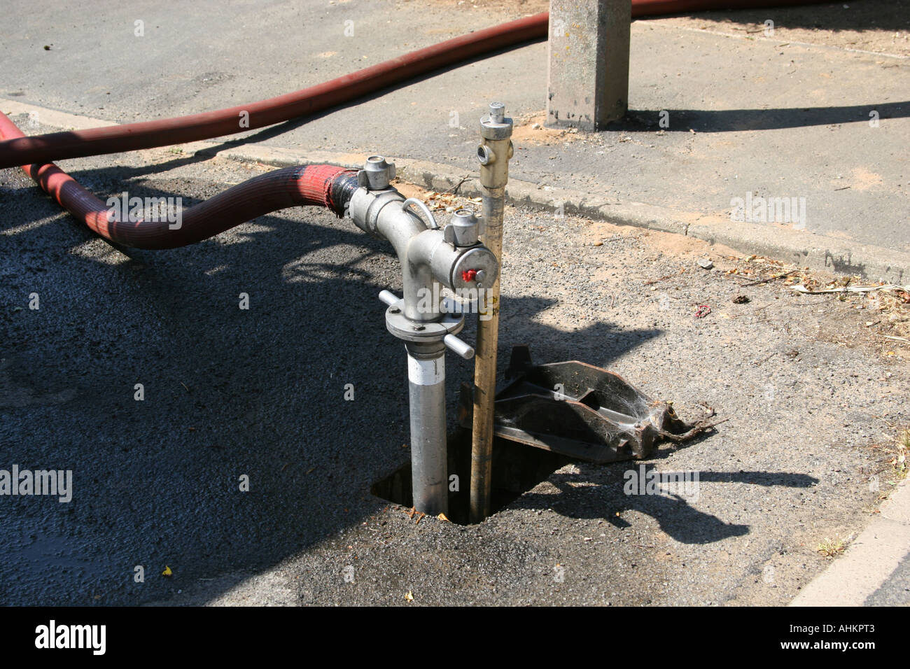 Hose connector in ground fire hydrant in street with control tap Stock ...