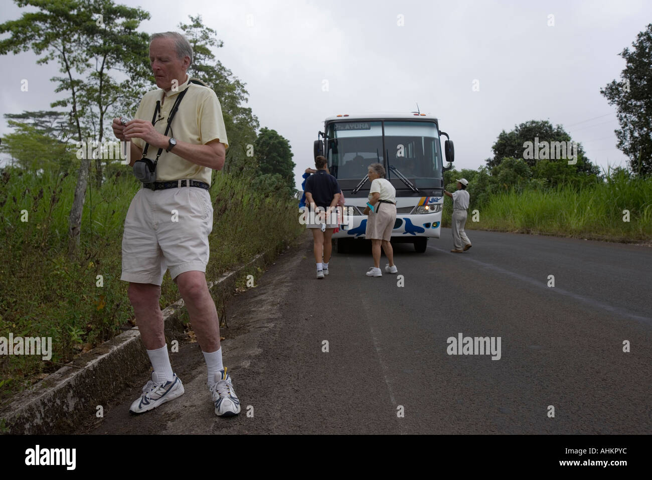 Ecuador Galapagos Islands Elderly American tourist takes snapshots of ...
