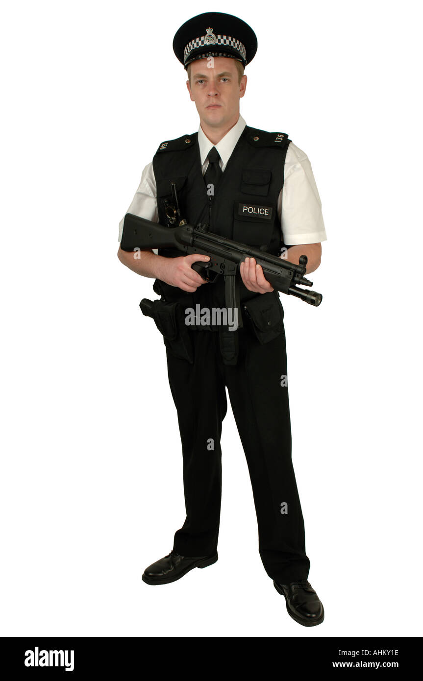 an armed police officer in uniform with a heckler kock MP5 automatic ...