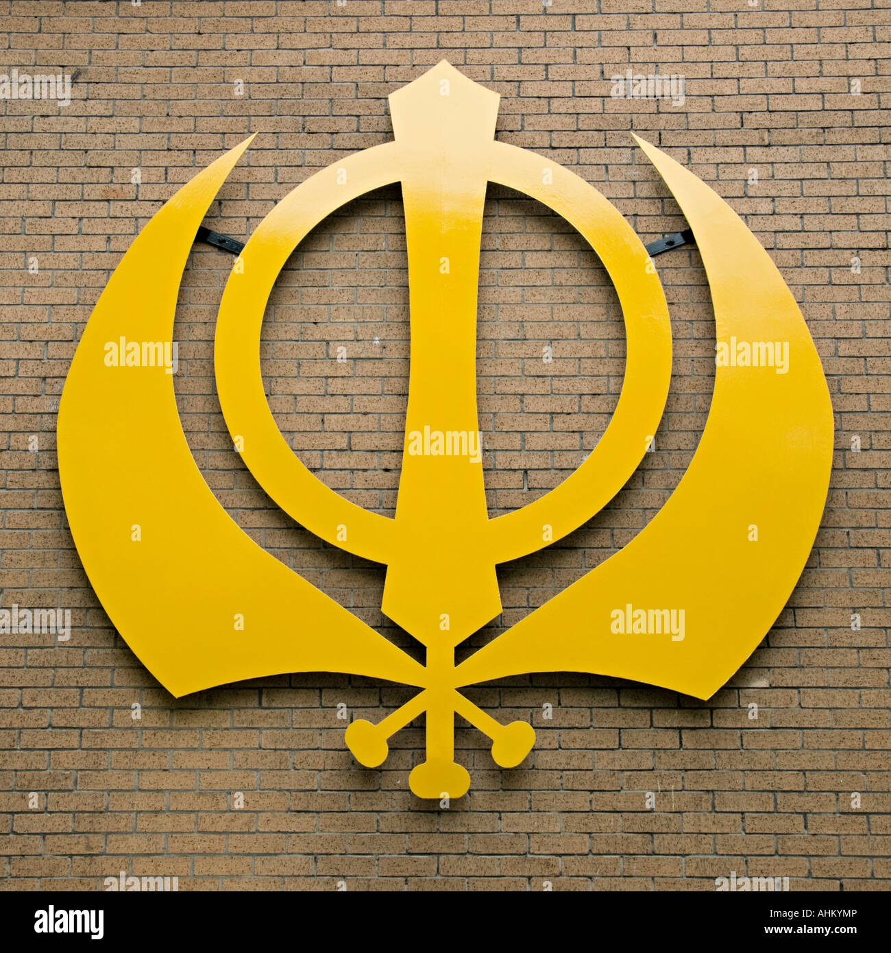 Sikh insignia mounted on temple wall Stock Photo - Alamy