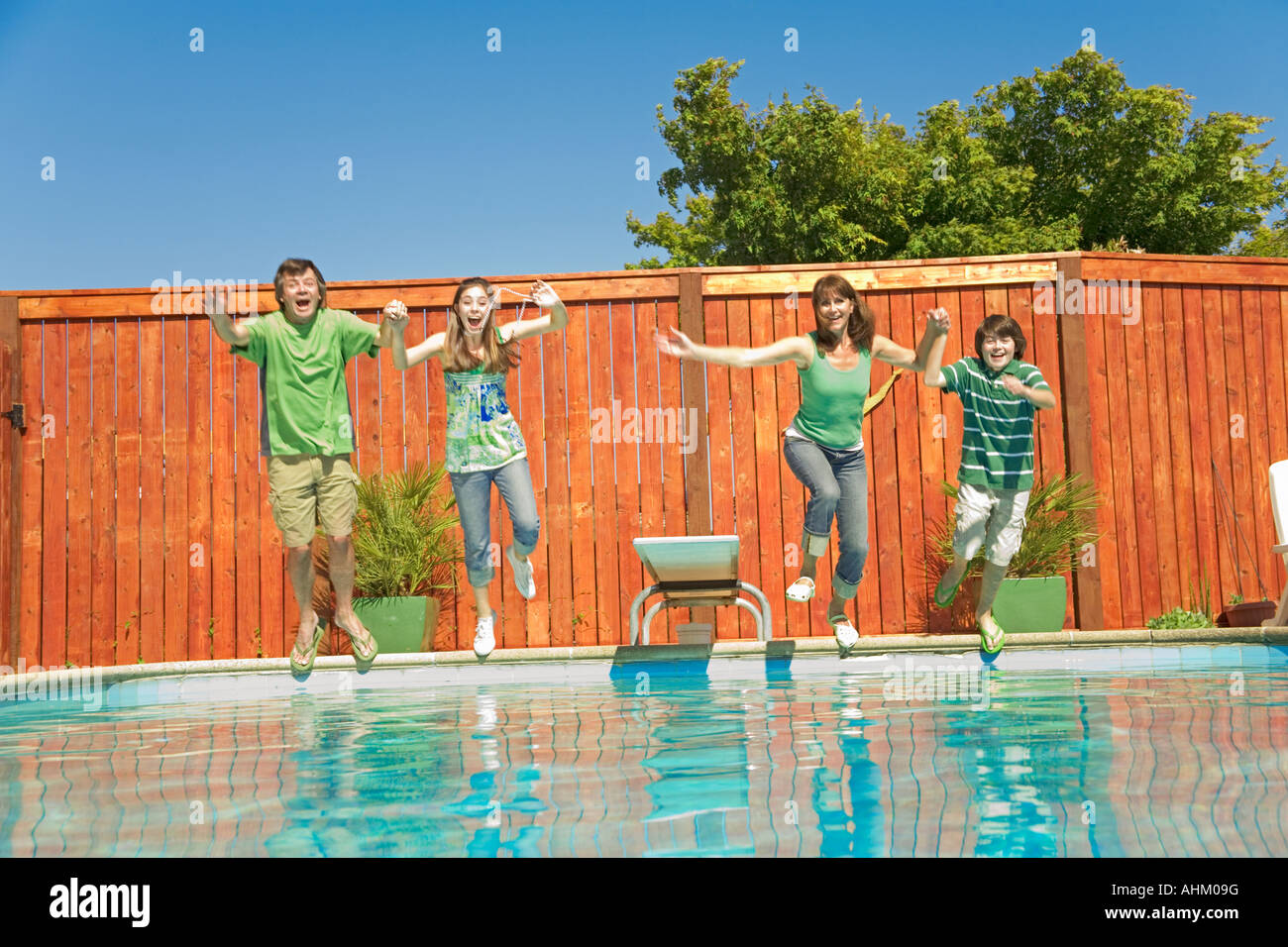 Mother Daughter Jumping Swimming Pool High Resolution Stock Photography ...