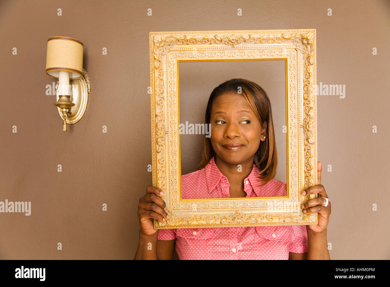 African descent holding frame hi-res stock photography and images - Alamy