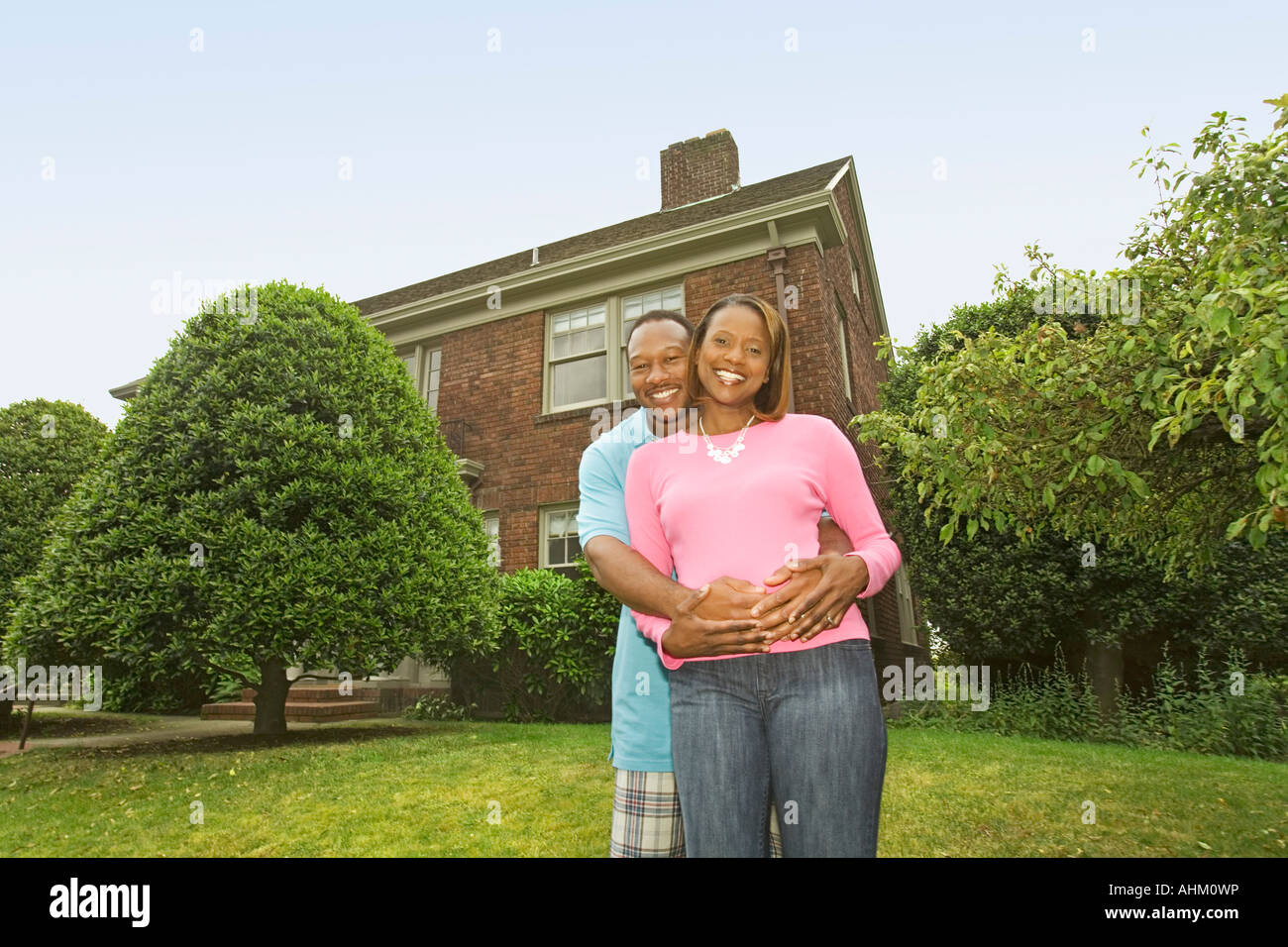 Middle age couple in front house hi-res stock photography and images ...