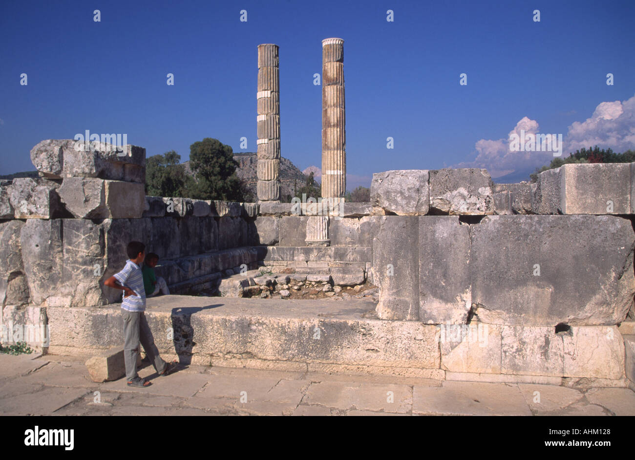 Child guide Temple of Leto Letoon Turkey Stock Photo - Alamy