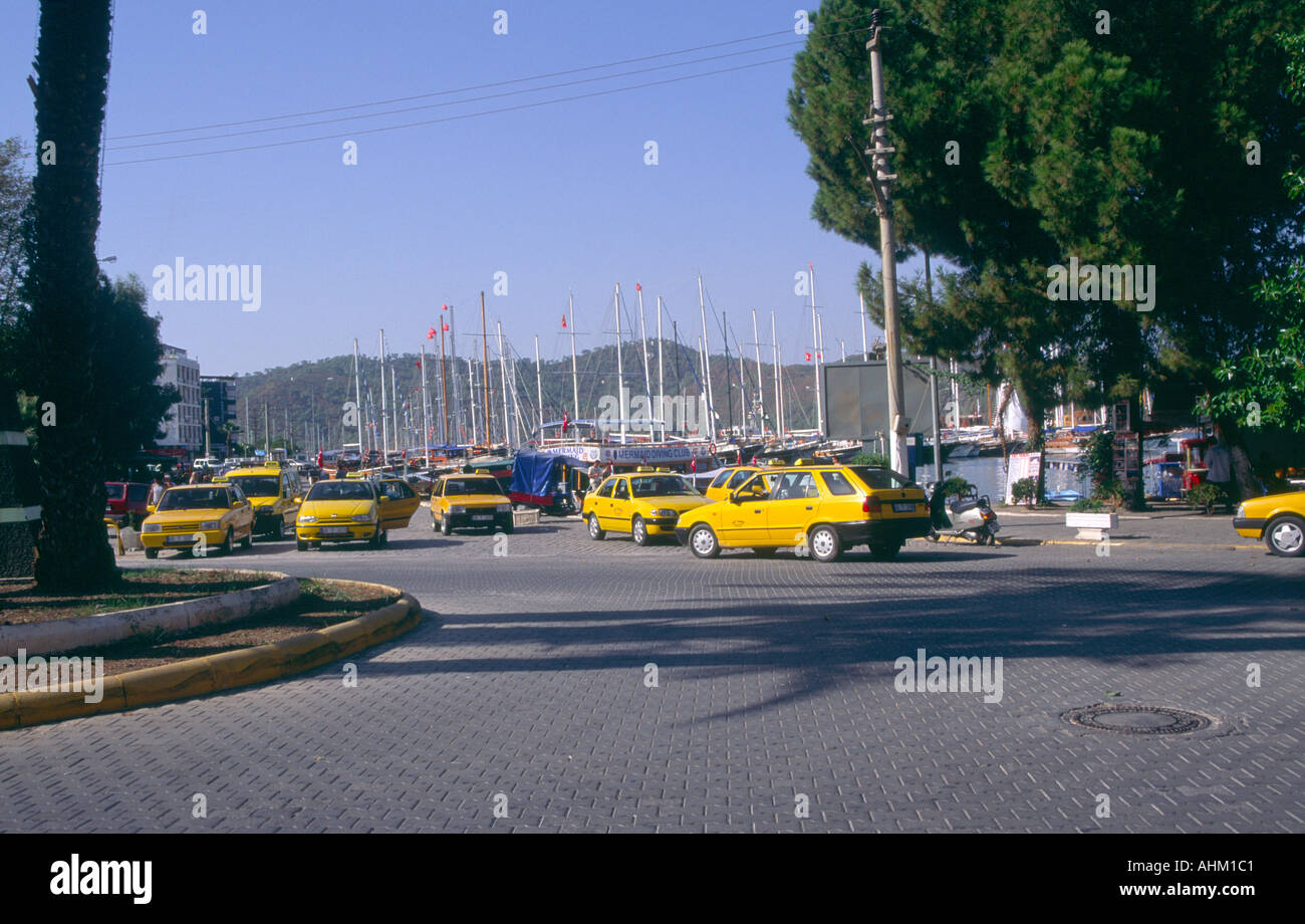 Yellow taxis by the harbour Fethiye Turkey Stock Photo - Alamy