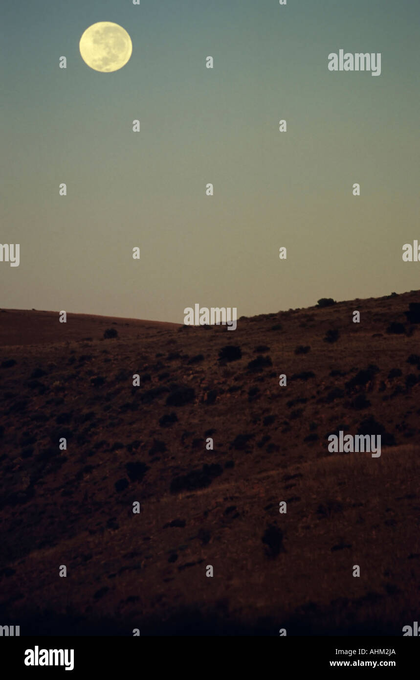 African moon setting Stock Photo - Alamy