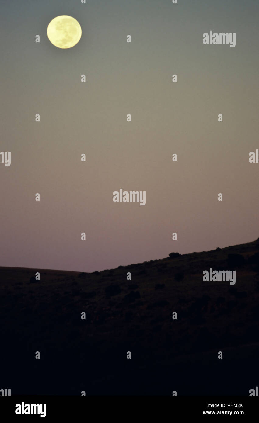 African moon setting Stock Photo - Alamy