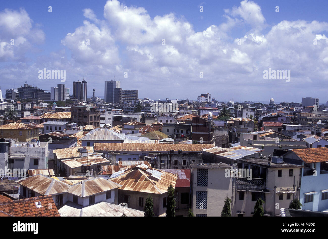 The roofs of the old town with the new modern high rise tall buildings ...