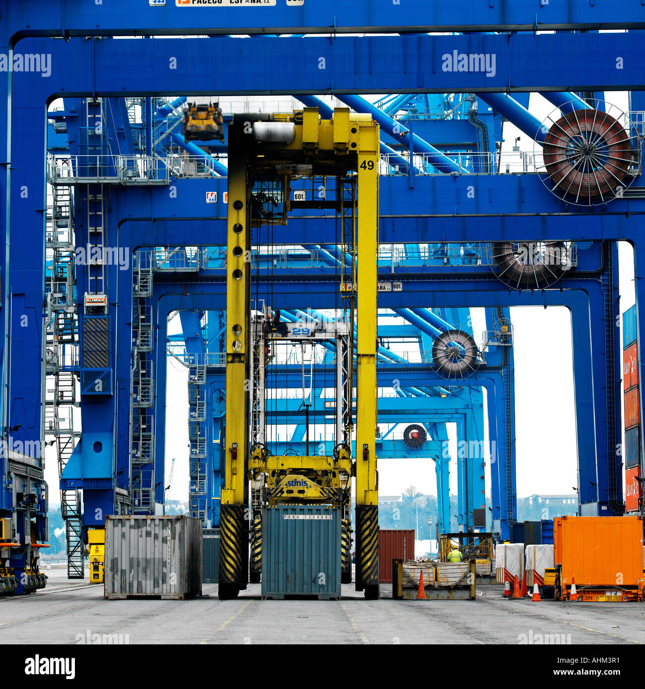 shipping and logistics straddle carrier Stock Photo - Alamy