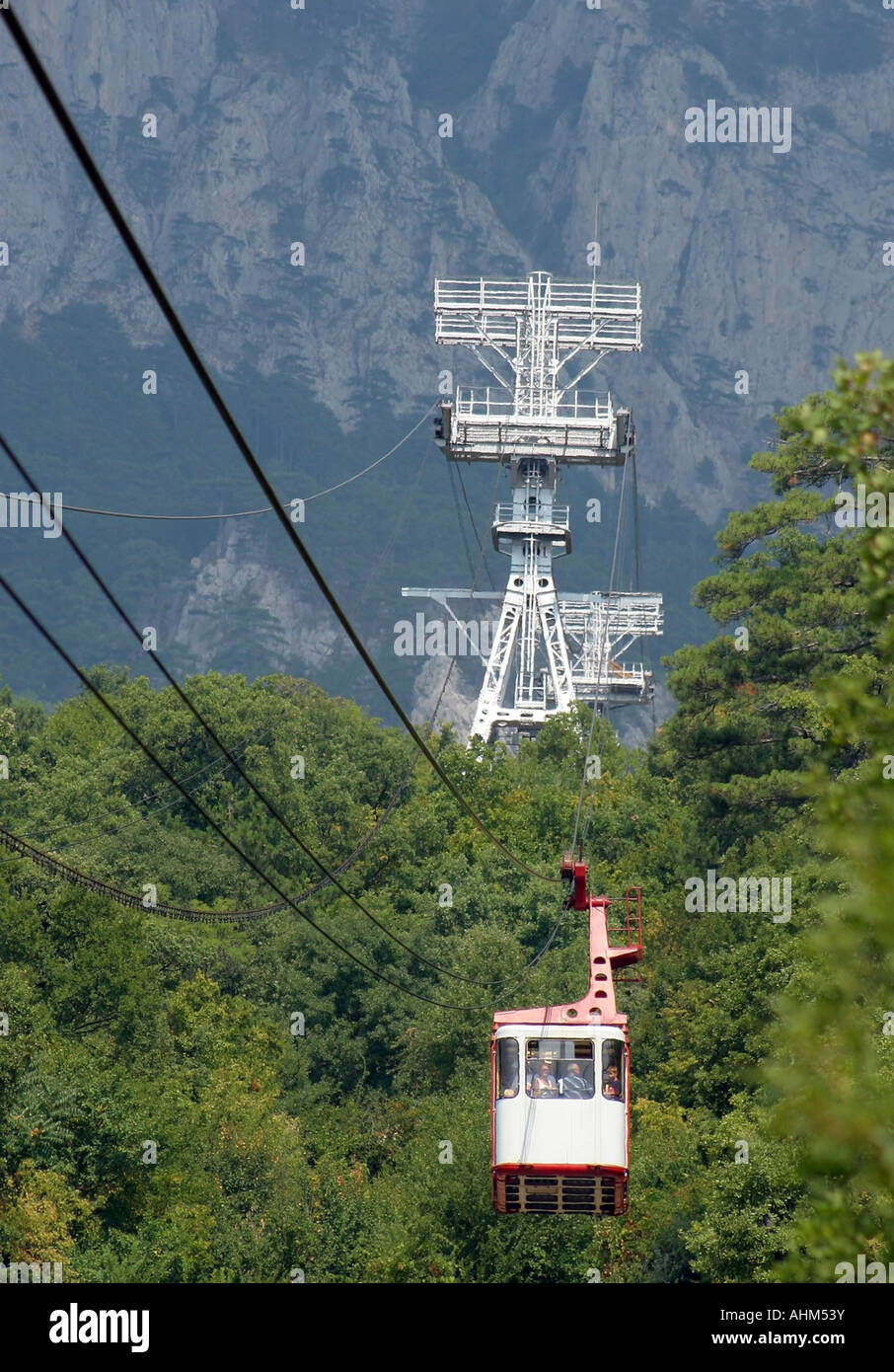 cable car above a wood crimea mountain ajpetri Stock Photo - Alamy