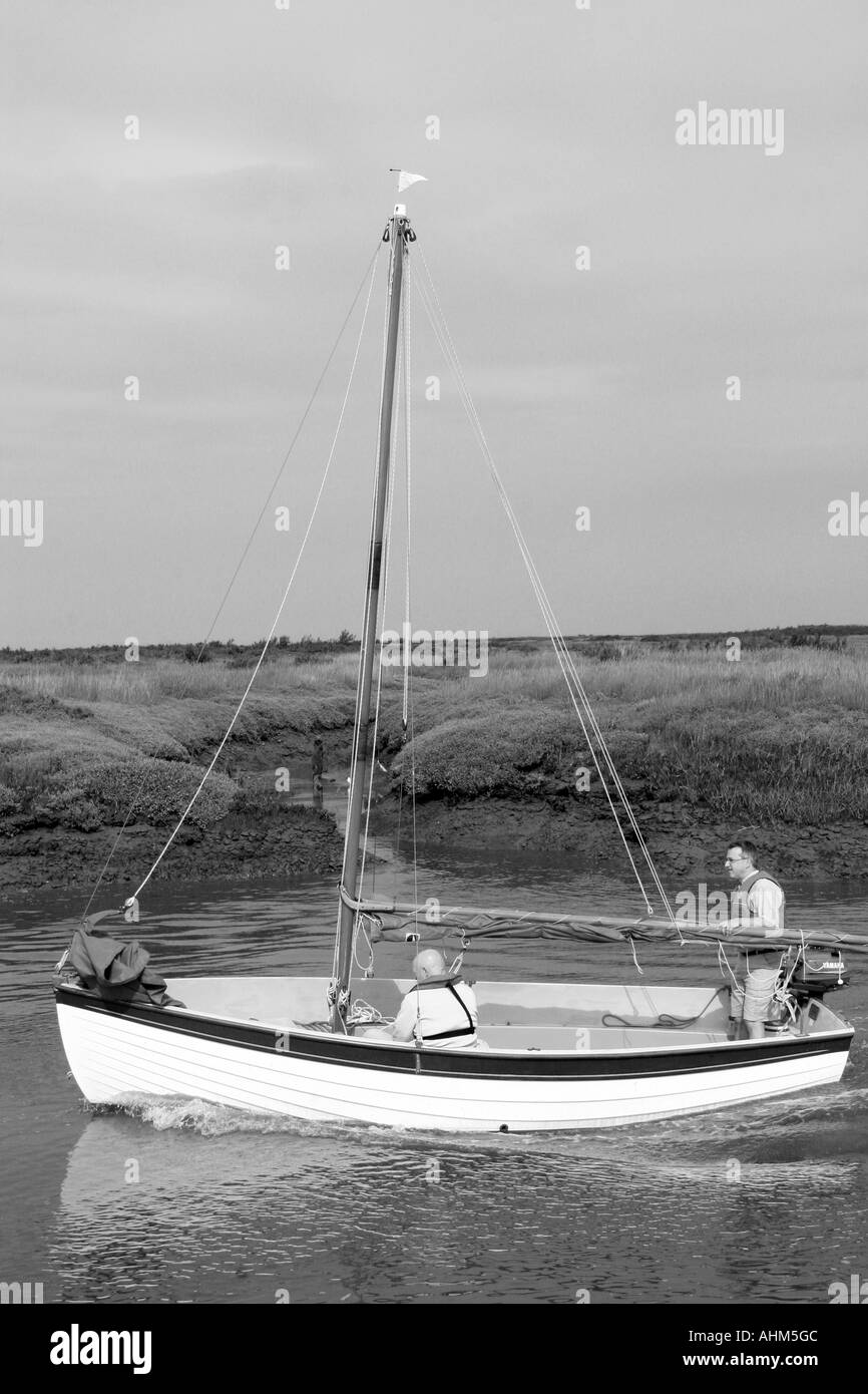 Two men off sailing Stock Photo - Alamy