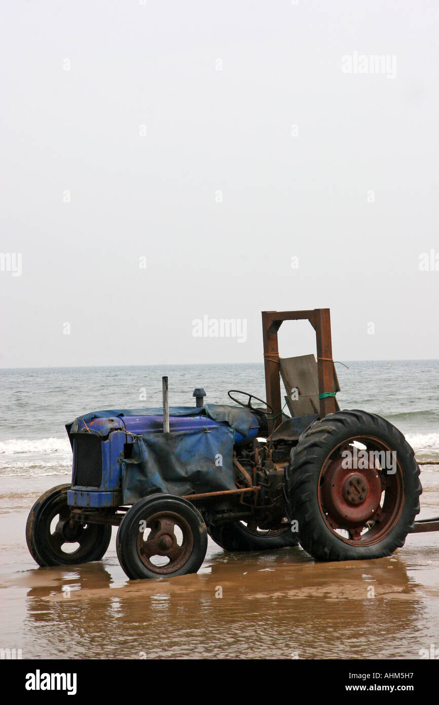 Tractor used for recovering fishing boats from the sea Stock Photo - Alamy