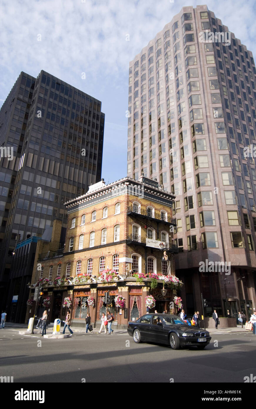 Old traditional English pub building sandwiched between tower blocks in ...