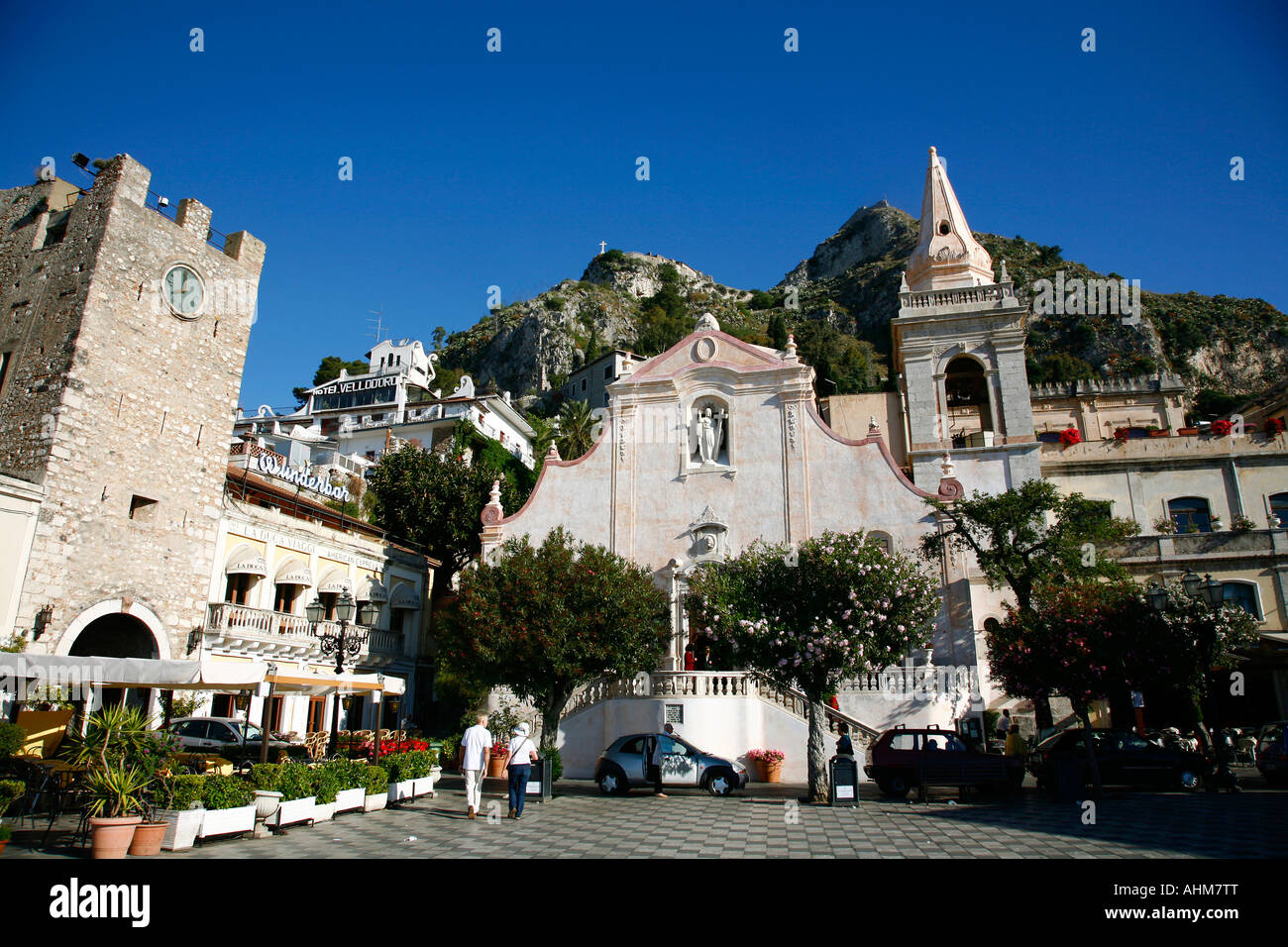 Piazza IX april with San Giuseppe church and the Mezzo gate Taormina ...