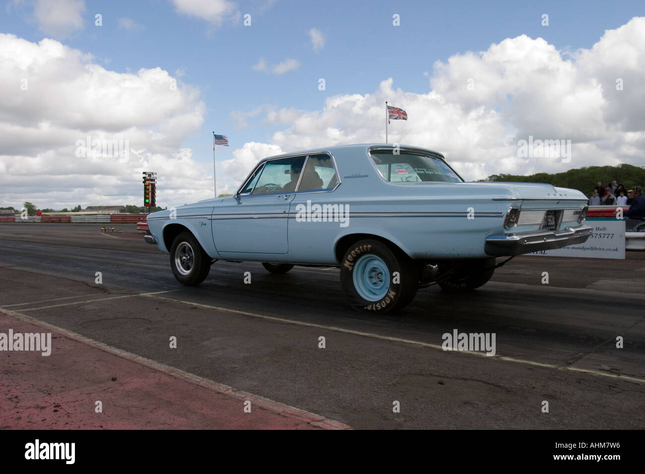 American muscle car on start line at drag race Stock Photo - Alamy