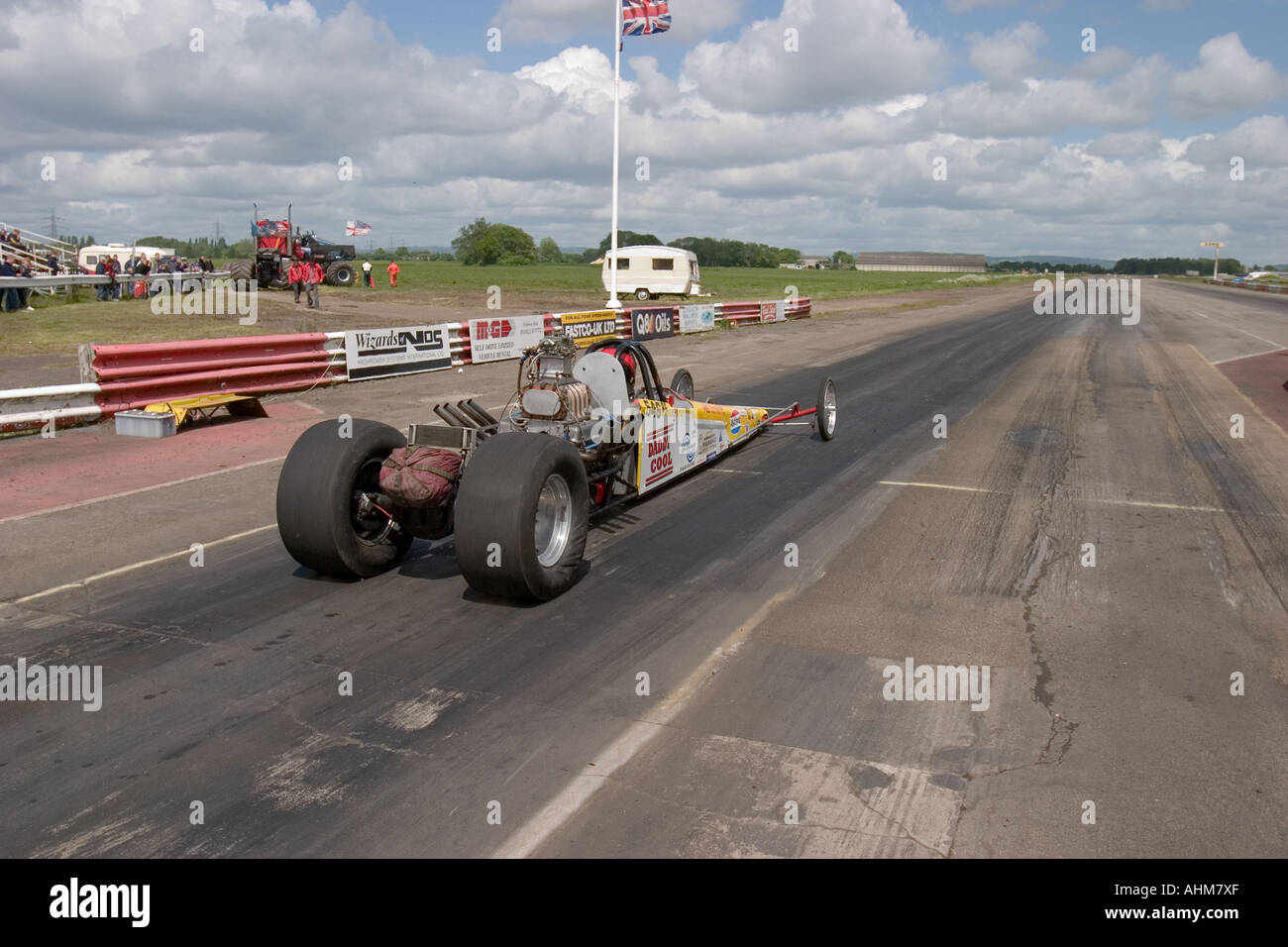 Dragster doing a test run to warm tyres prior to drag race Stock Photo ...