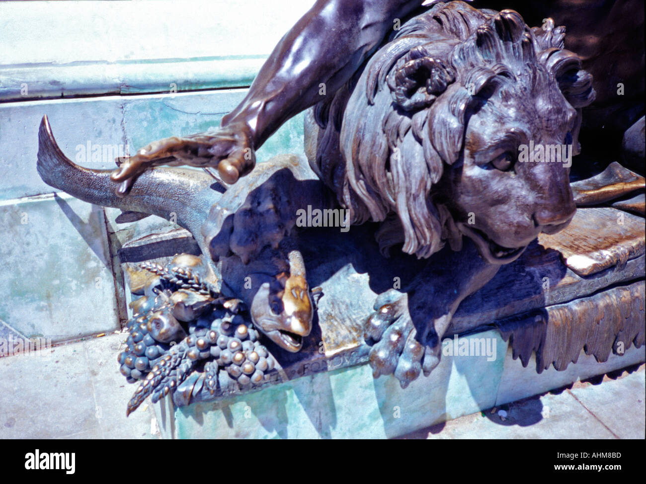 details of a lion head and fish in bronze on the statue of Louis the ...