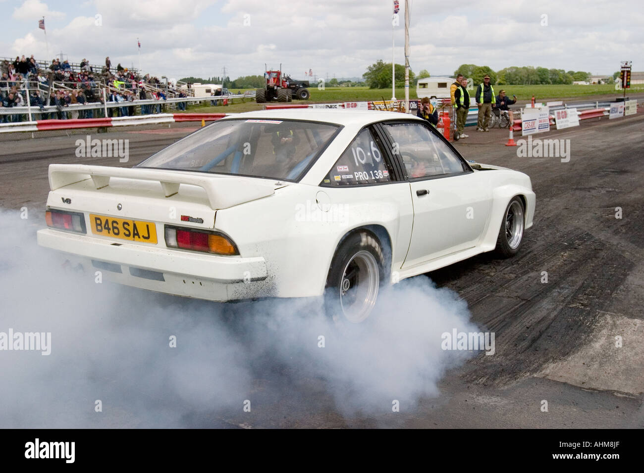 Heavily modified Opel doing a burnout at drag race Stock Photo - Alamy